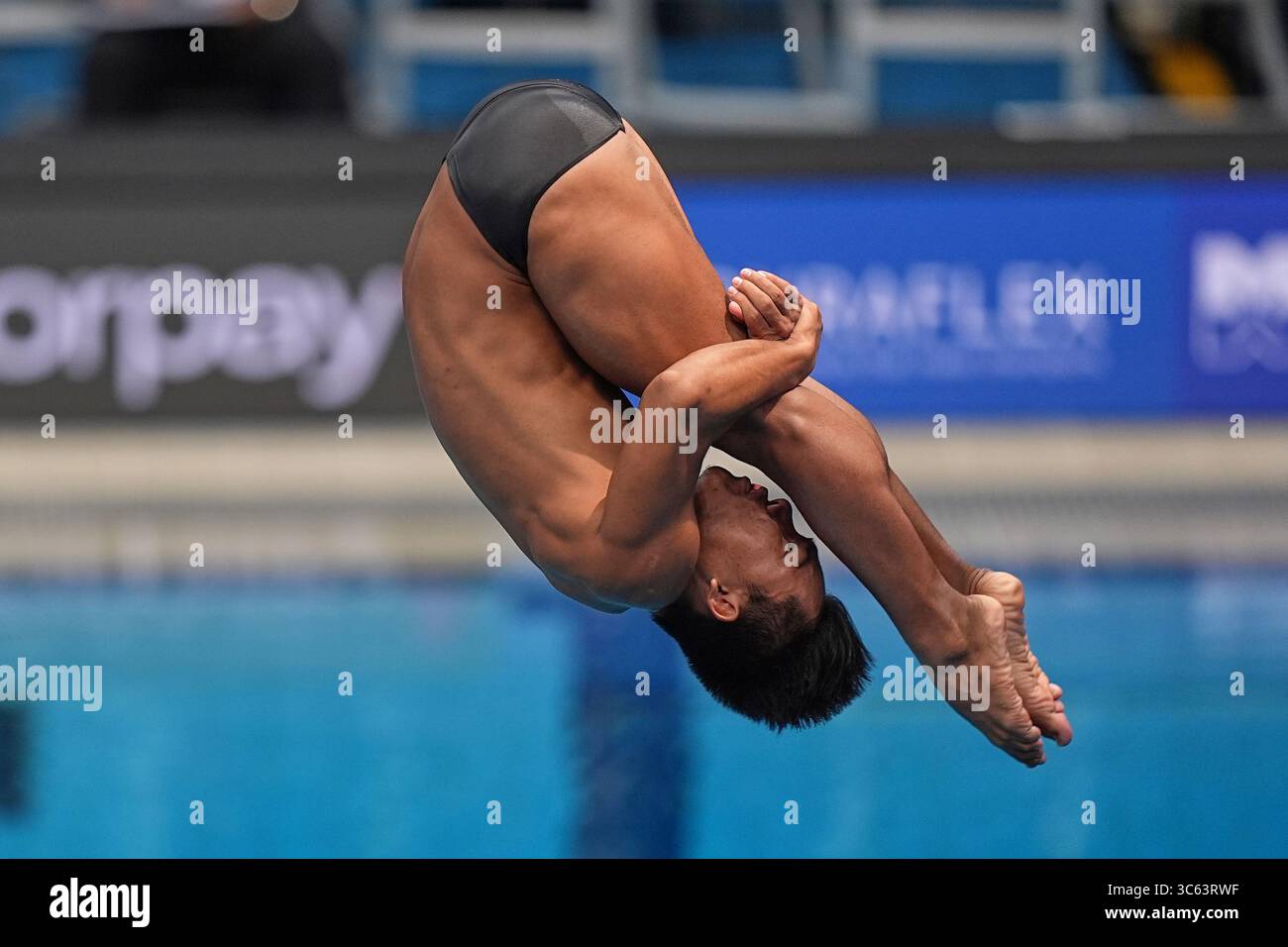 Premson Meitei Yumnam of India competes in the men's 3m springboard ...