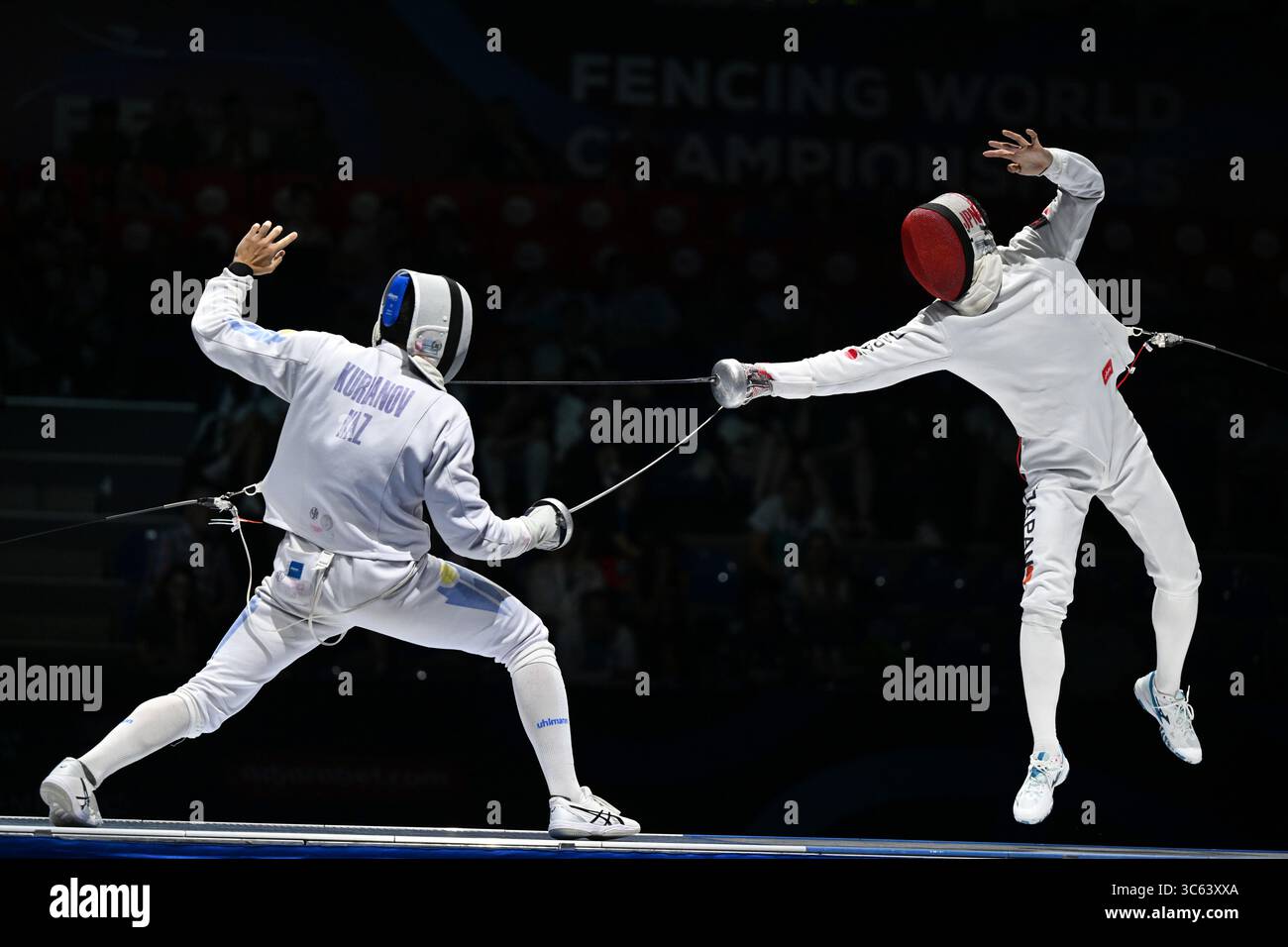 Japan's Koki Kano (R) fights against Kazakhstan's Ruslan Kurbanov ...