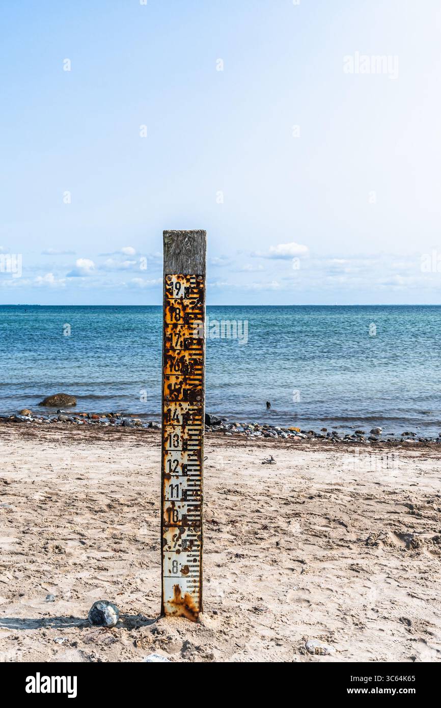 Tool for measuring water depth or sea level mark at a beach ...