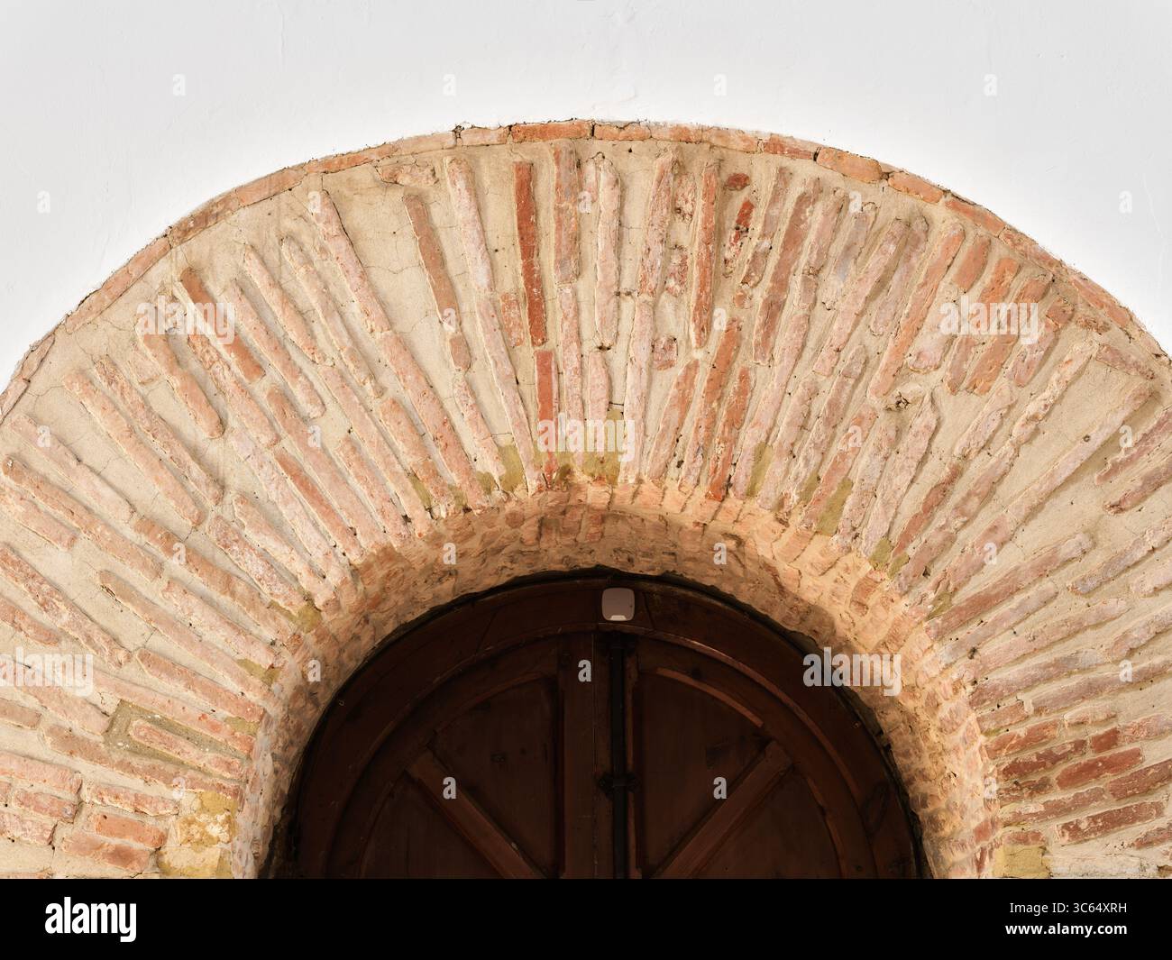 Roman bricks used to form a semi-circle arched lintel at All Saints ...