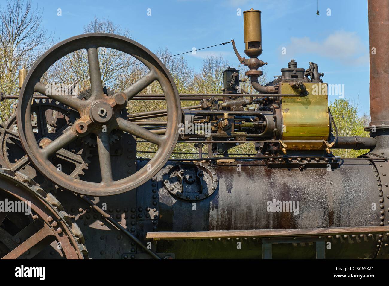 Copper steam whistle on the cylinder head of a Foster traction engine ...