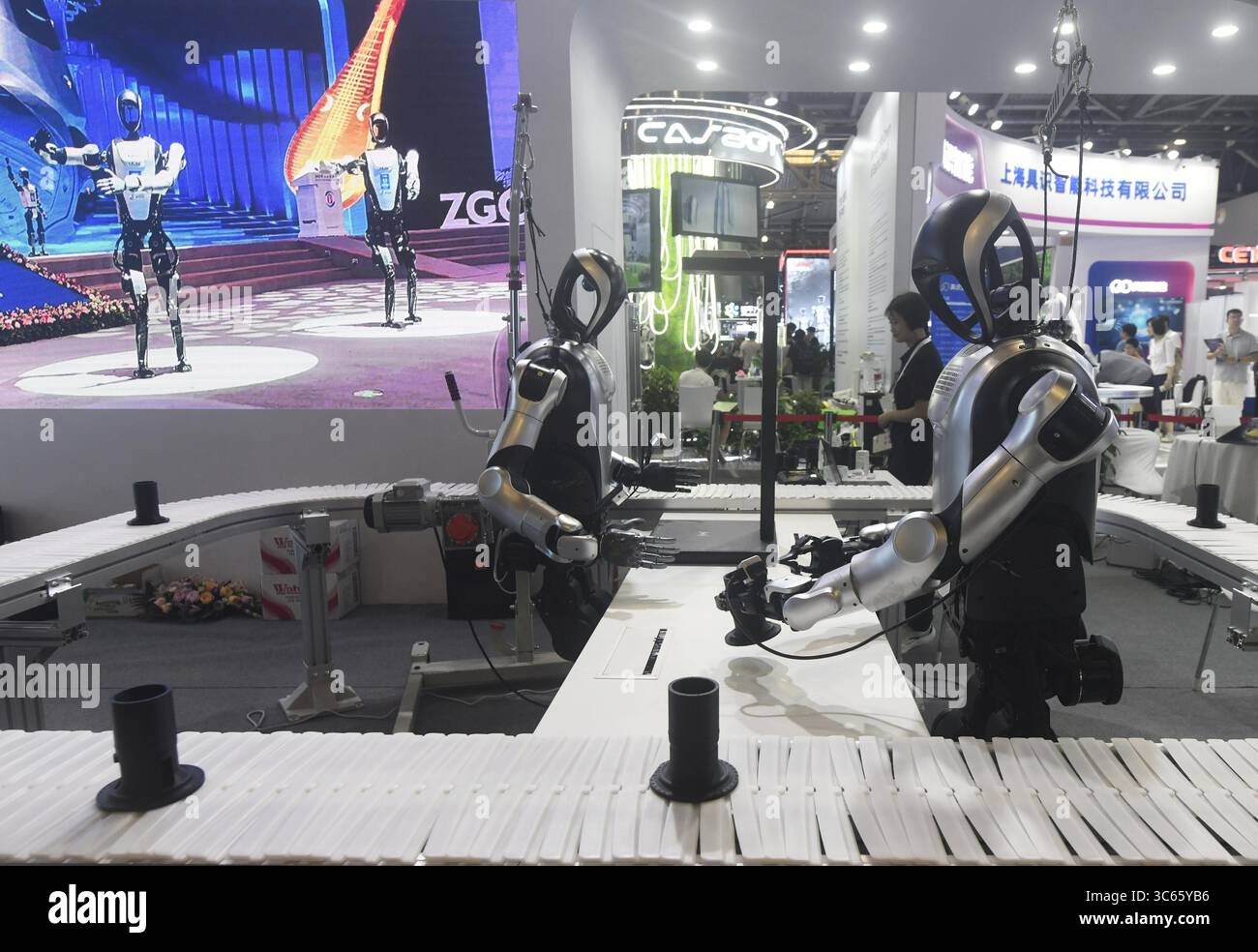 People visit the 2025 World AI Conference in Shanghai, China, 28 July ...