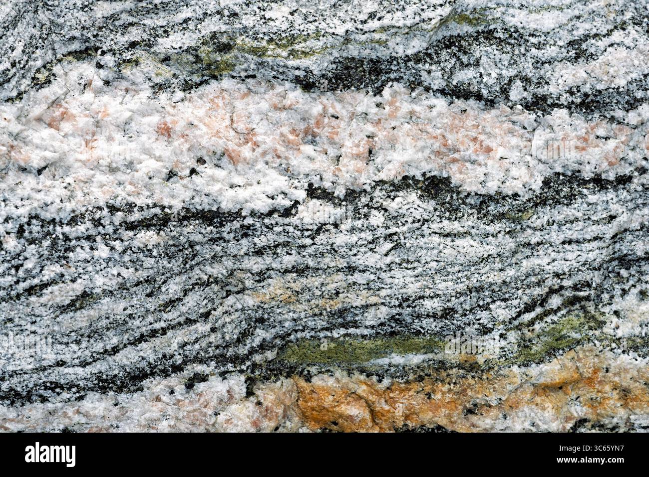Intricate textures of a natural rock formation exhibit various mineral ...