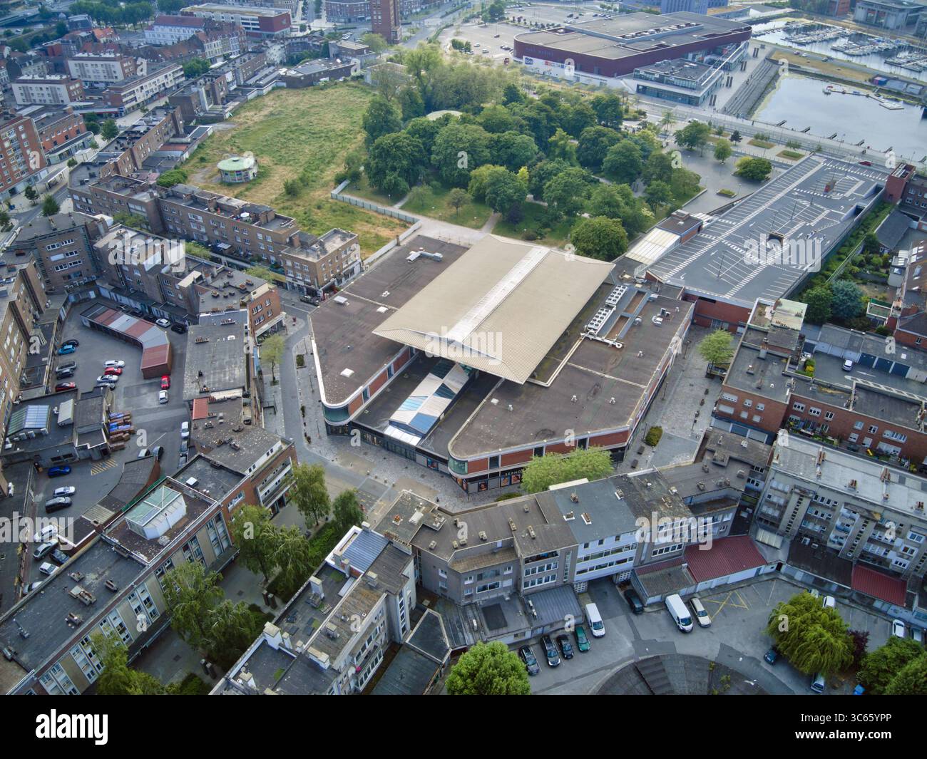 Aerial view of a modern shopping center surrounded by classic buildings ...