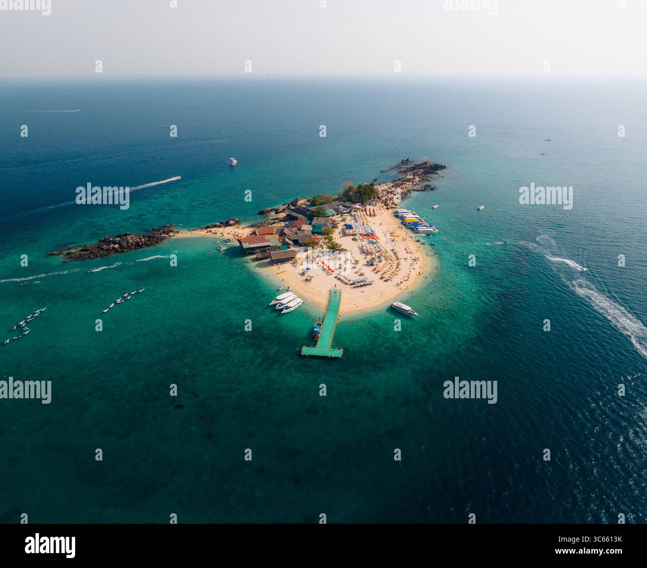 Aerial view of a vibrant Khai Nai Island, where turquoise waters meet ...