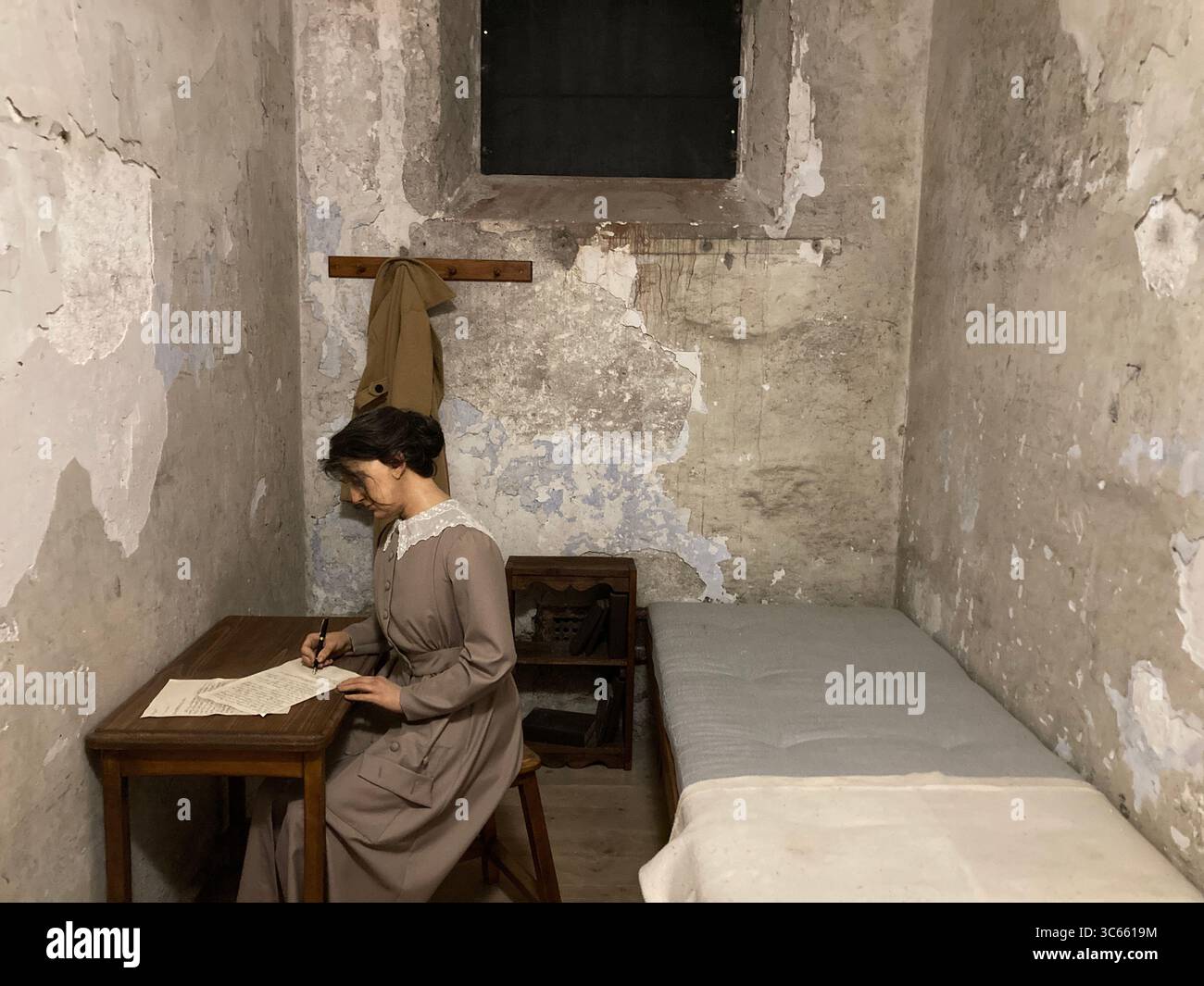 Interior view of Cork City Gaol museum showcasing historic prison cell ...