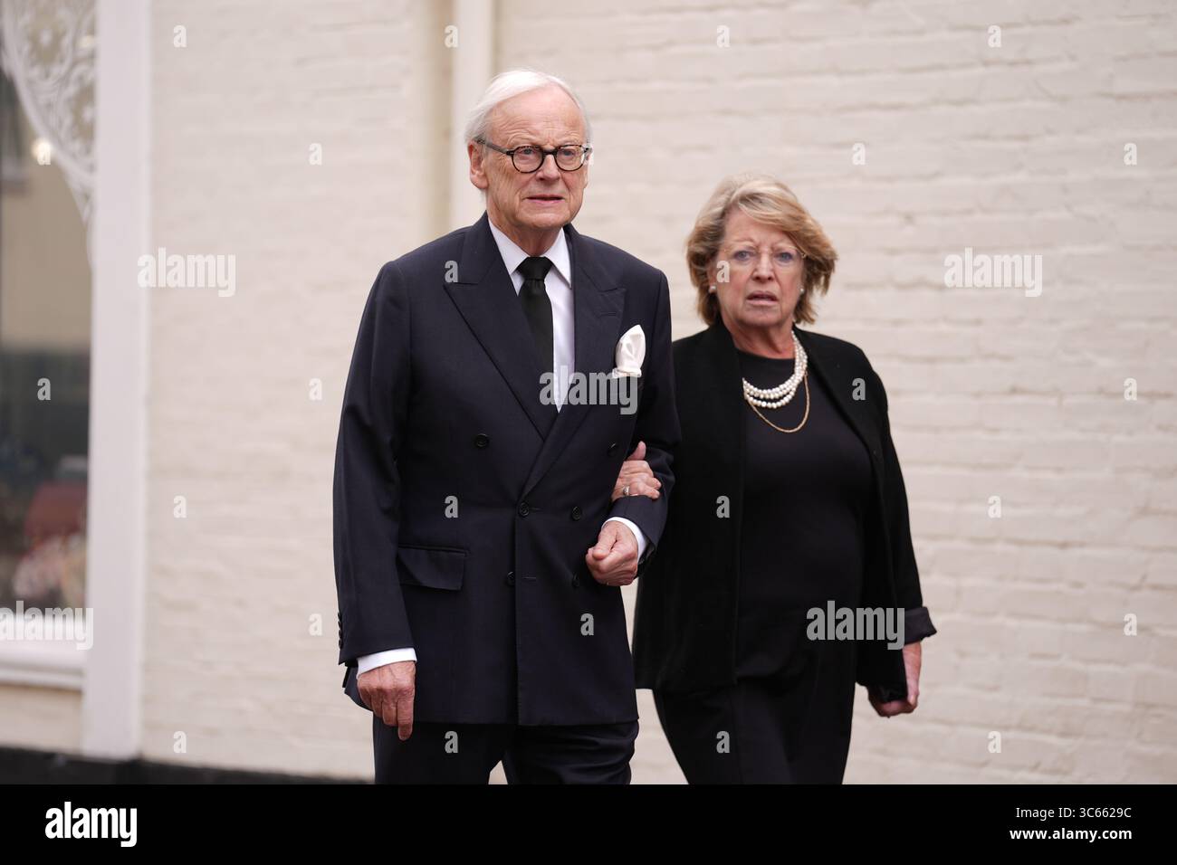 Lord Deben John Gummer (left) attends the funeral of Lord Norman Tebbit ...