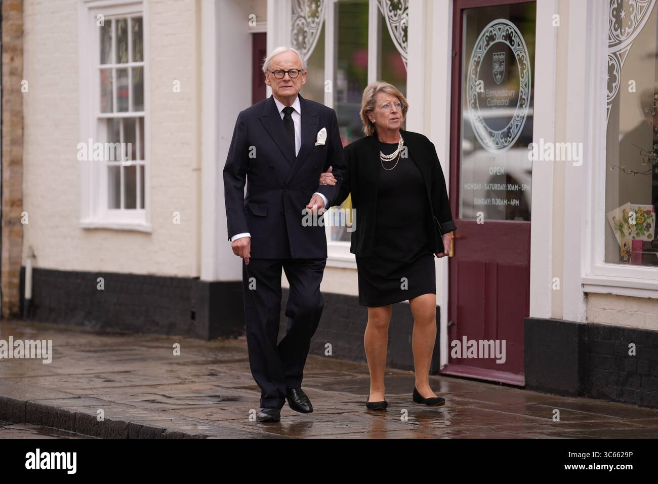 Lord Deben John Gummer (left) attends the funeral of Lord Norman Tebbit ...