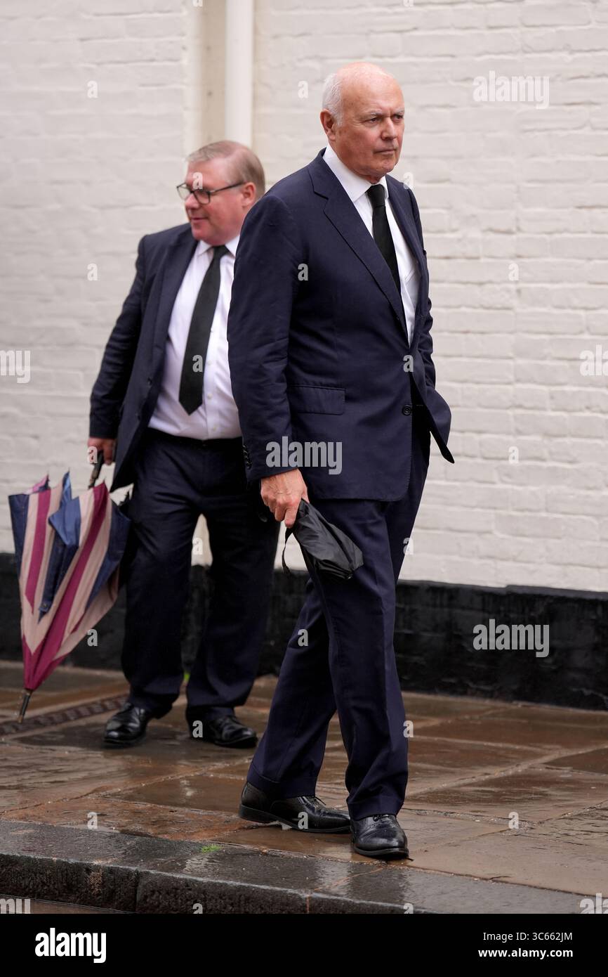 Mark Francois (left) and Sir Iain Duncan Smith attend the funeral of ...