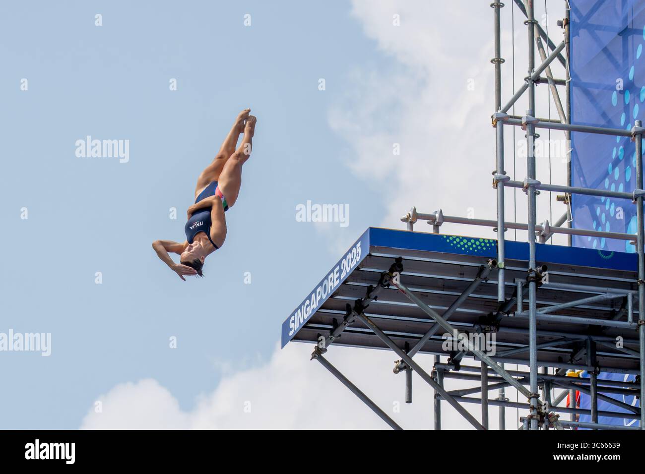 Singapore, Singapore - 25 July 2025: View of a diver gracefully ...