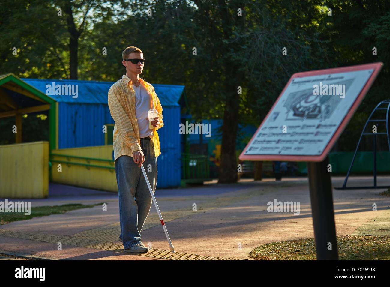 Person walking on tactile paving hi-res stock photography and images ...