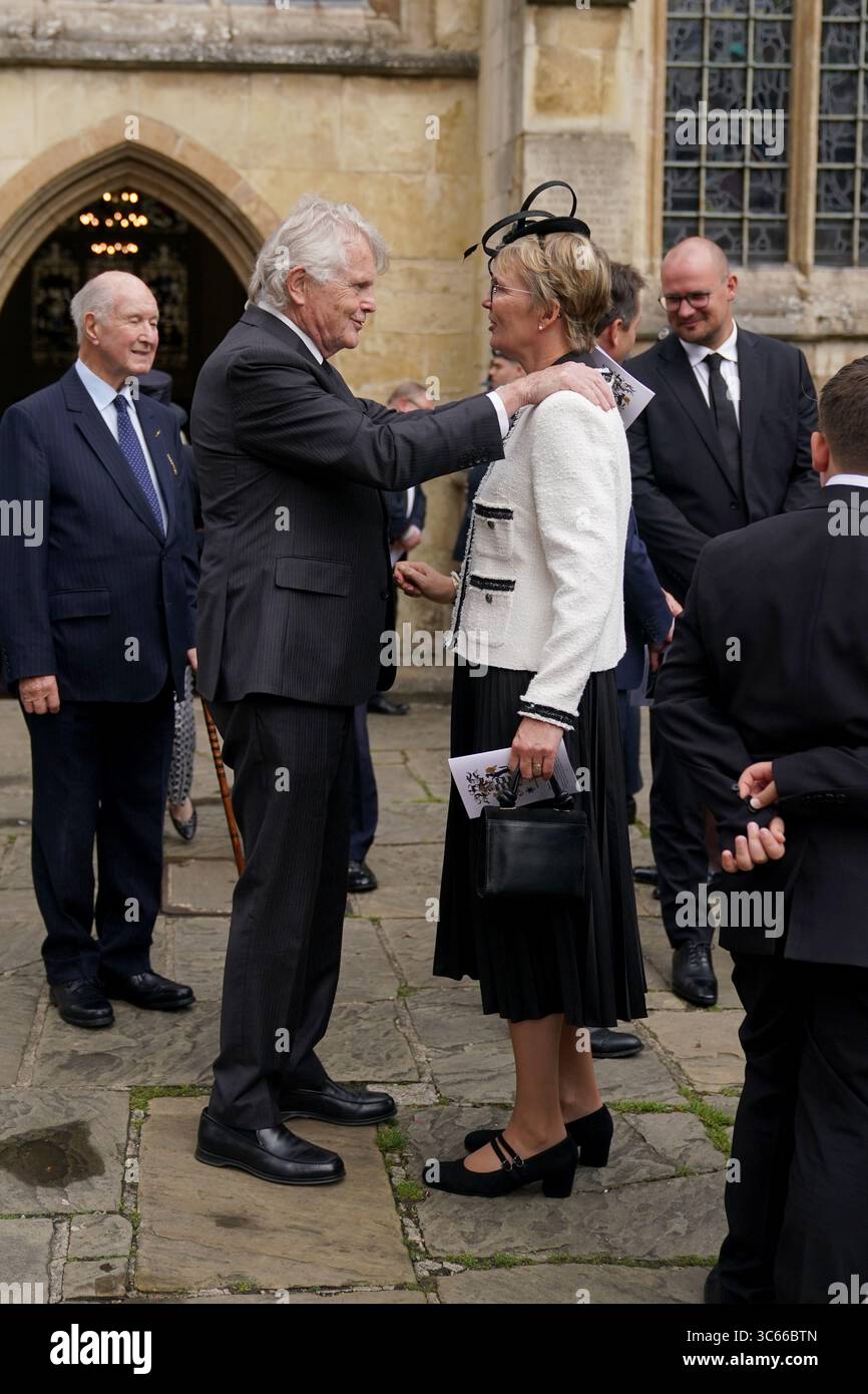 Lord Dobbs (left) speaks with Alison Tebbit (right) following the ...
