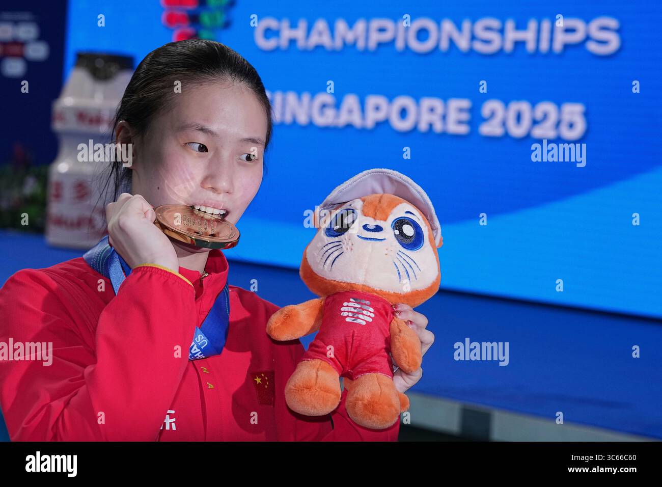 Chen Yuxi of China poses with her gold medal following the women's 10m ...