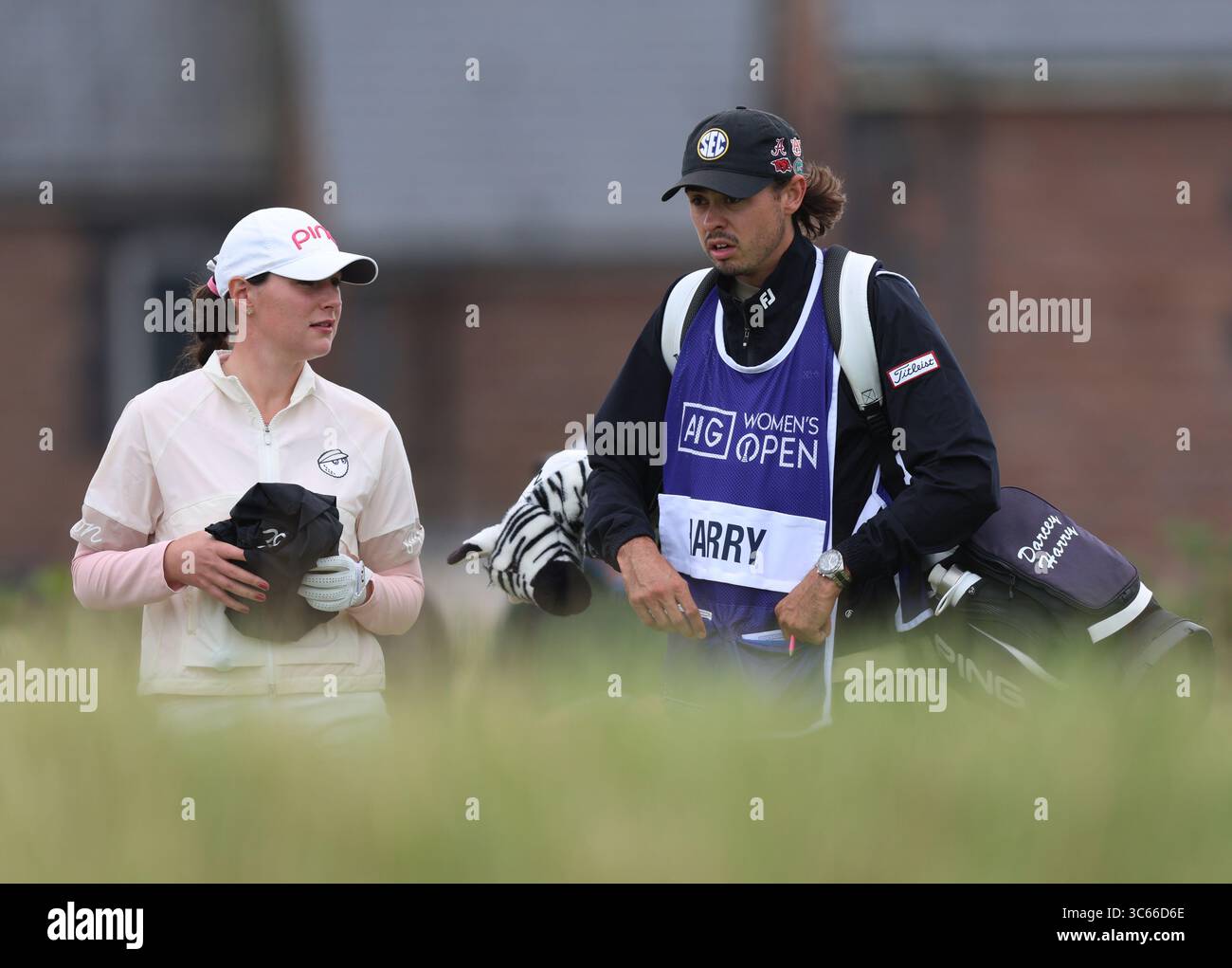 Wales's Darcey Harry speaks to her partner and caddie, Danish golfer ...