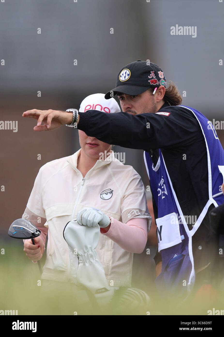Wales's Darcey Harry speaks to her partner and caddie, Danish golfer ...