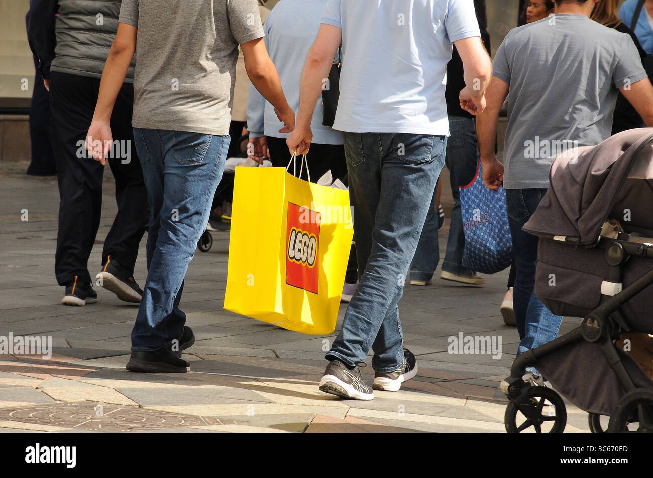 Copenhagen/ DenmarK/31 JULY 2025/ lego shopper with lego shopping bag ...