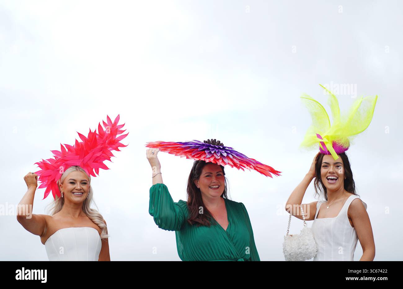Designer Martha Galvin, from Mayo, (centre) displays her hats along ...