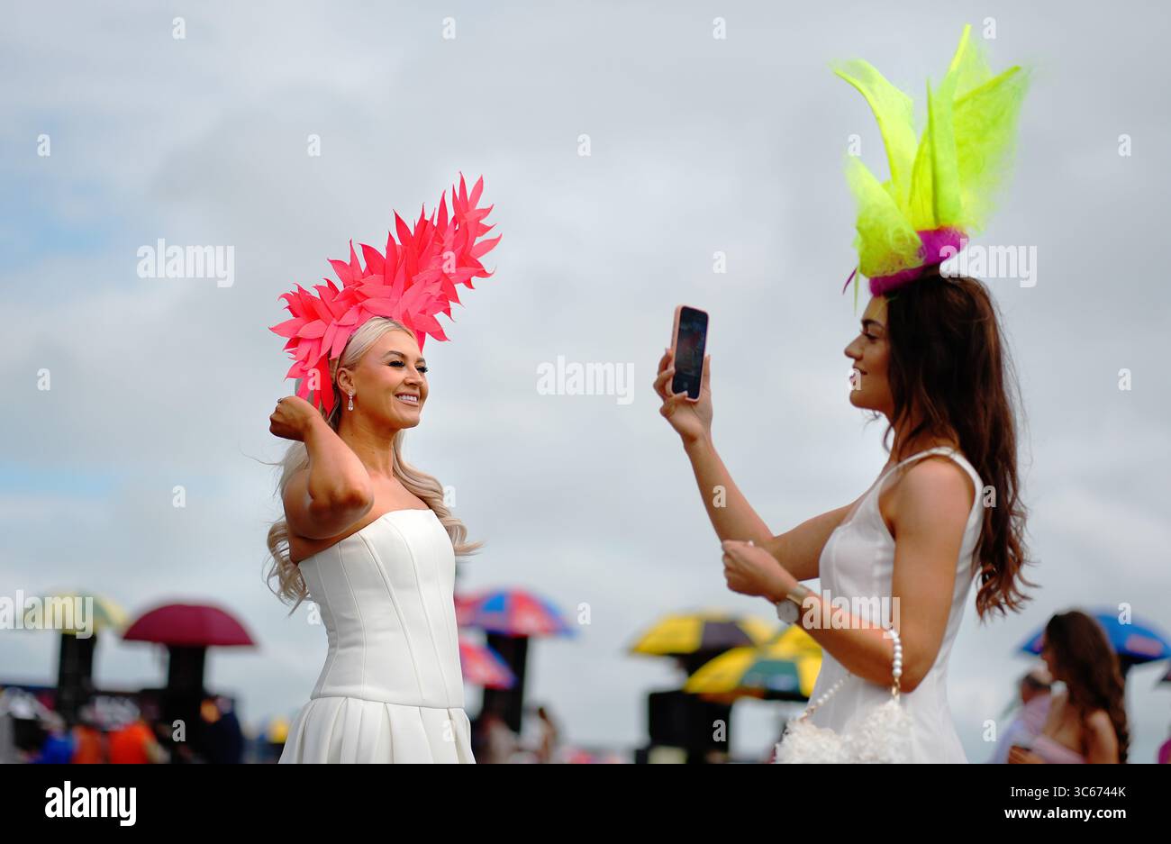 Laura Nash (left) and Andrea Murray, from Mayo, arrive for ladies day ...