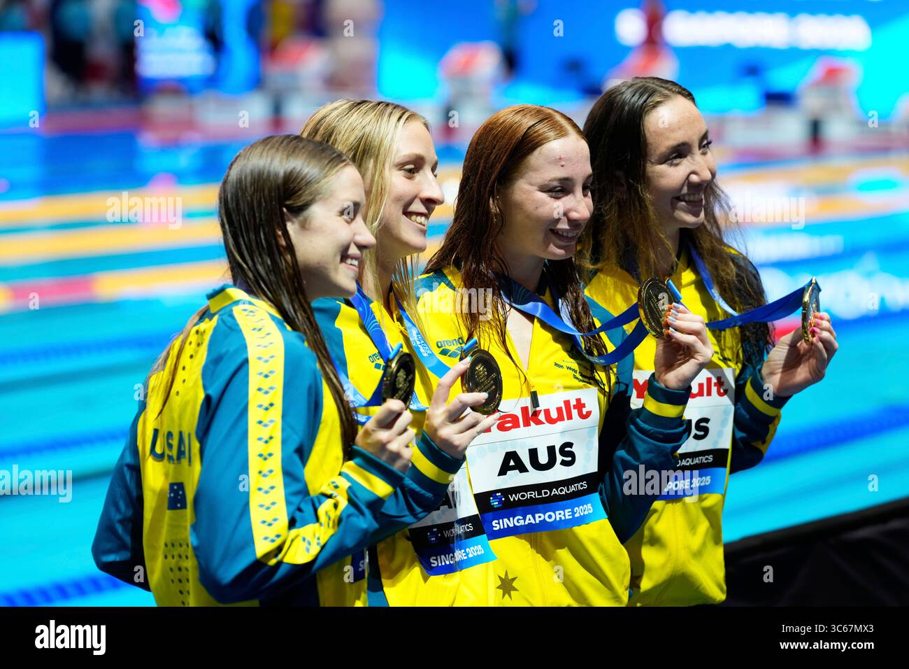 Gold medalists team Australia pose after the women's 4x200-meter freestyle relay final at the ...