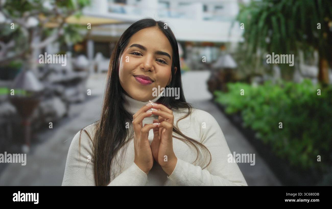 Confident woman hands plotting street latin hispanic young smiling ...