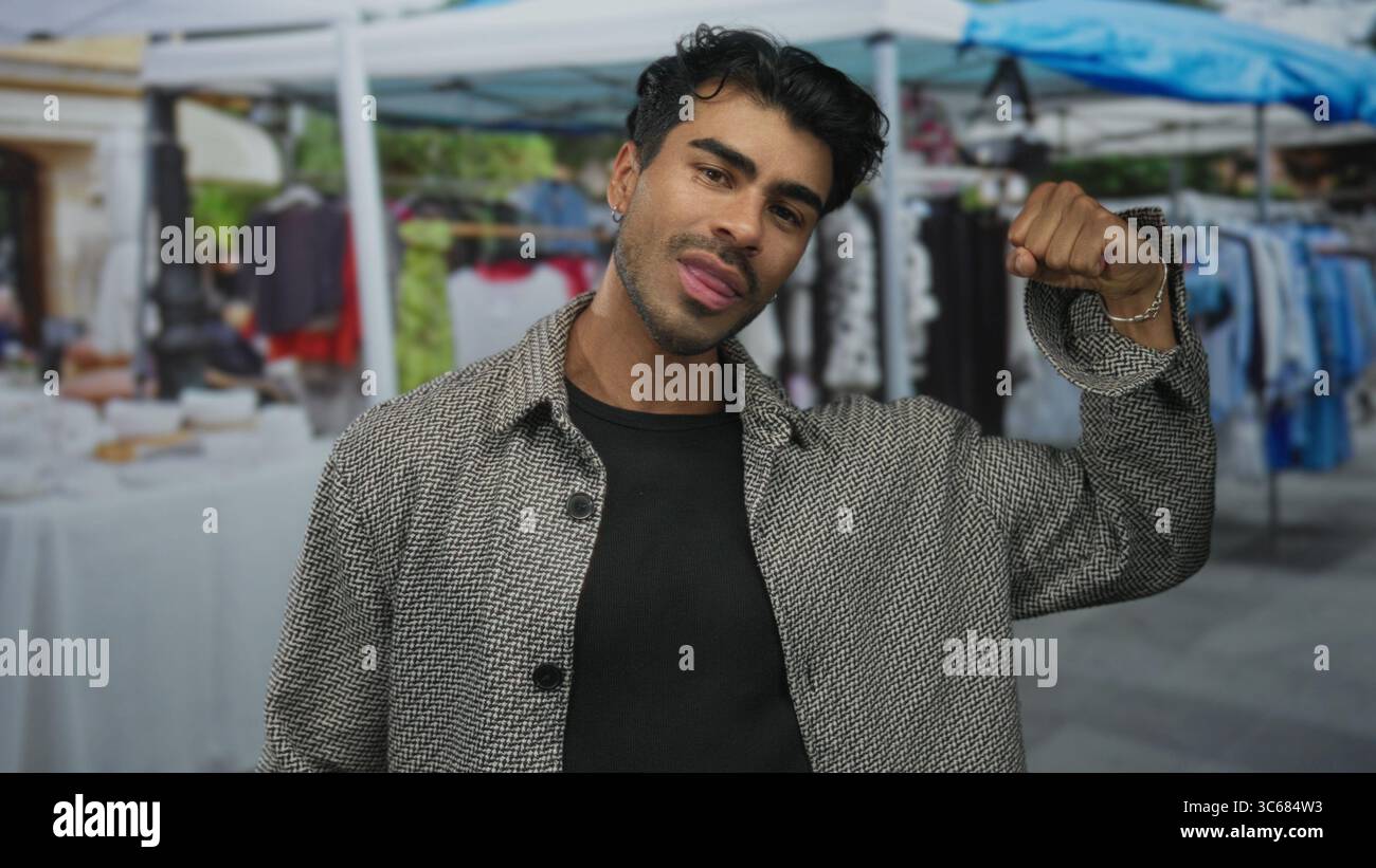 Man wearing coat flexes hi-res stock photography and images - Alamy