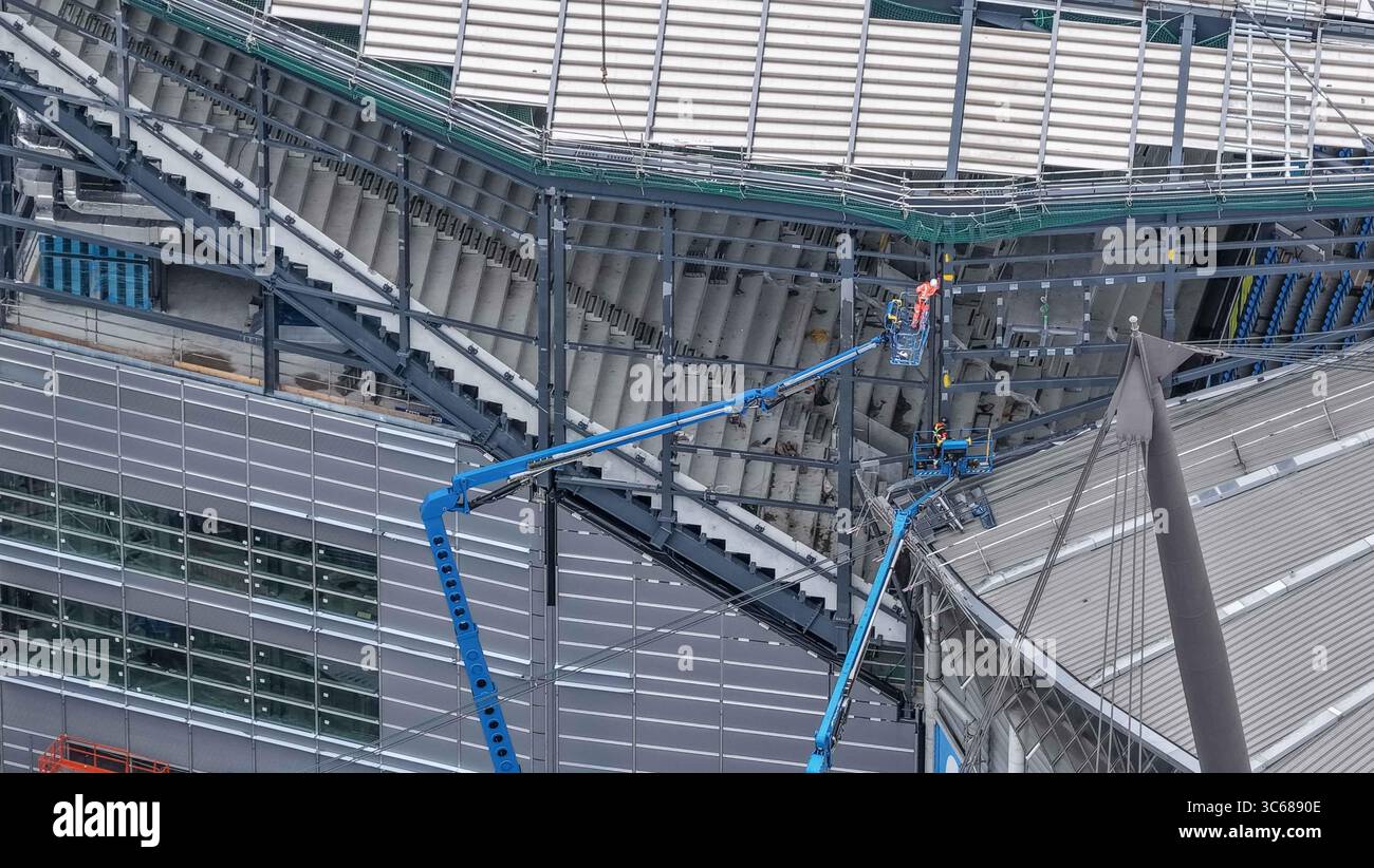 The North Stand of the Etihad Stadium is presently being expanded as ...