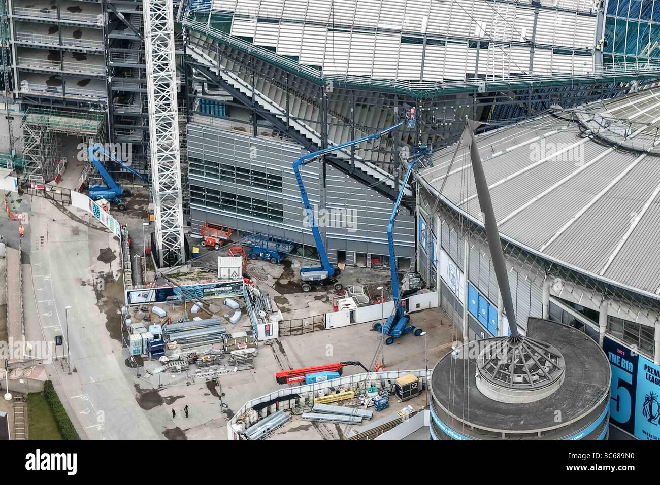The North Stand of the Etihad Stadium is presently being expanded as ...