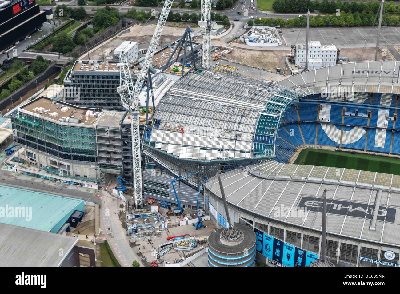 The North Stand of the Etihad Stadium is presently being expanded as ...
