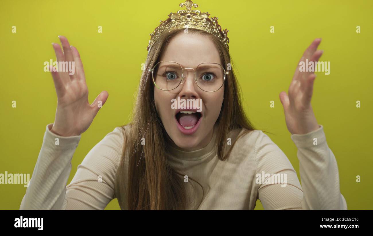 Woman wearing crown glasses raises hi-res stock photography and images ...