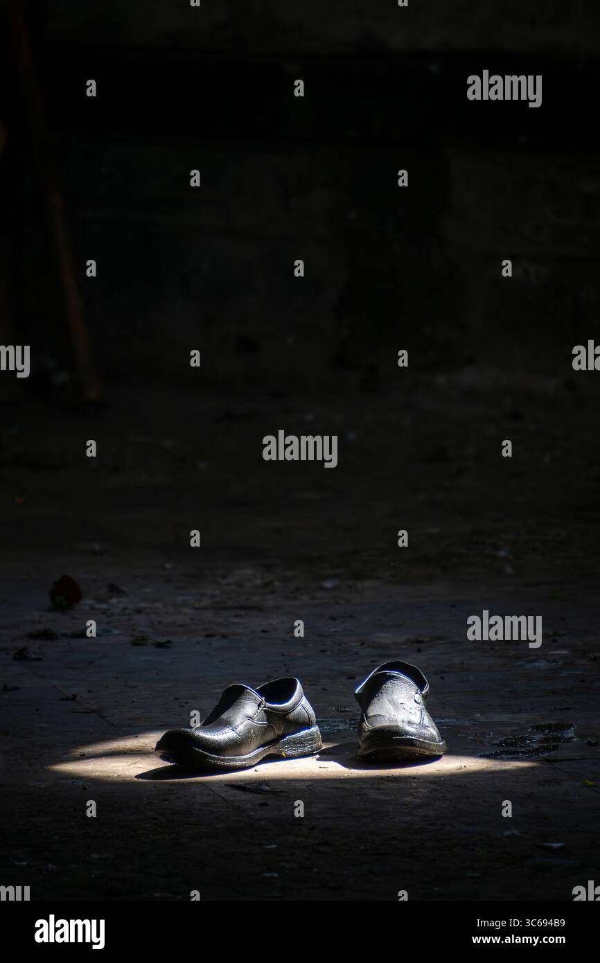 Shoes in spot sunlight hi-res stock photography and images - Alamy