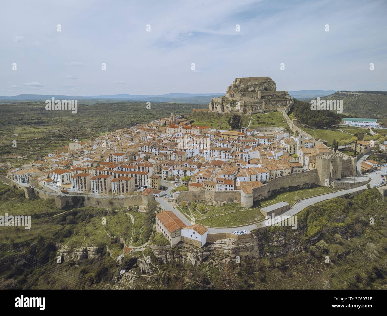 Aerial view of the ancient walled city with its iconic castle perched ...