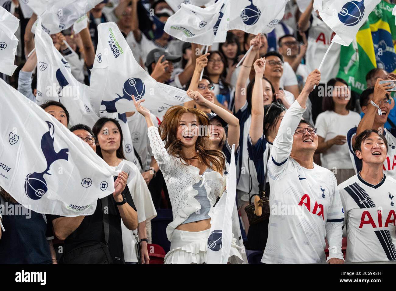 Tottenham Hotspur's fans cheer during a friendly soccer match between ...