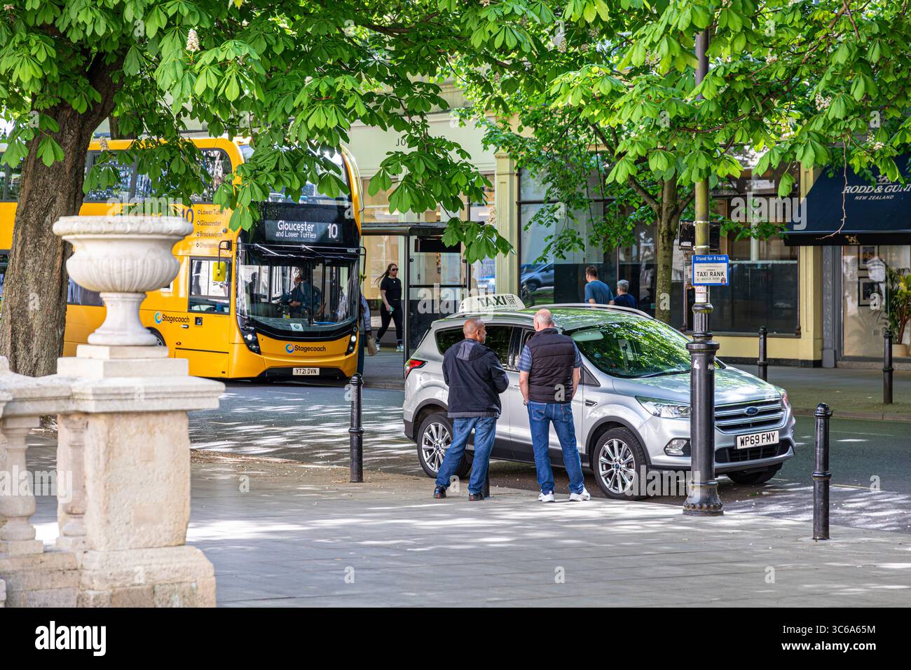 Two taxi drivers having a chat at the taxi rank on The Promenade ...