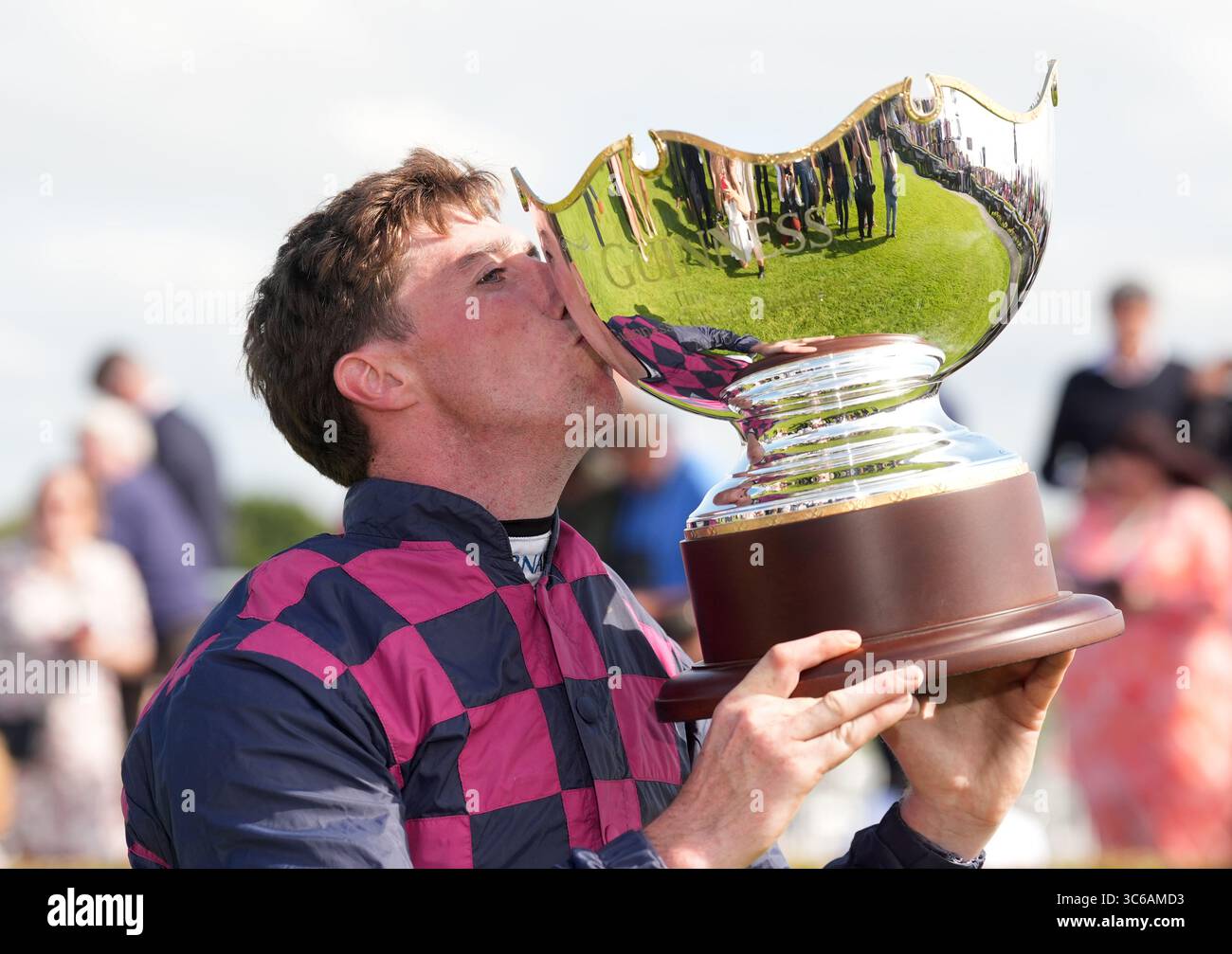 Jack Kennedy kisses the trophy after winning the Guinness Galway Hurdle ...