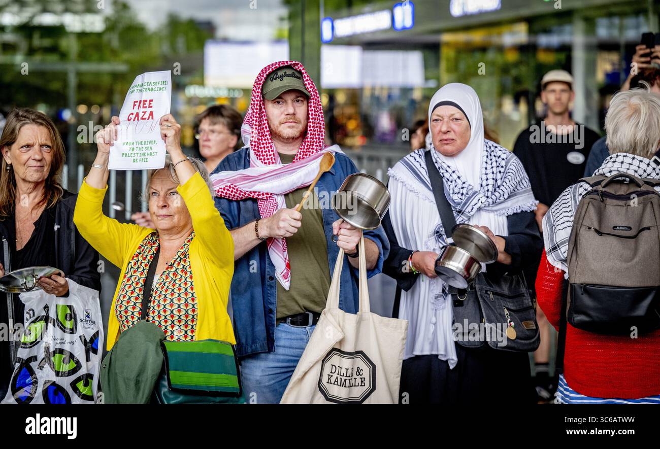 ROTTERDAM - Participants during a protest at Rotterdam Central Station ...
