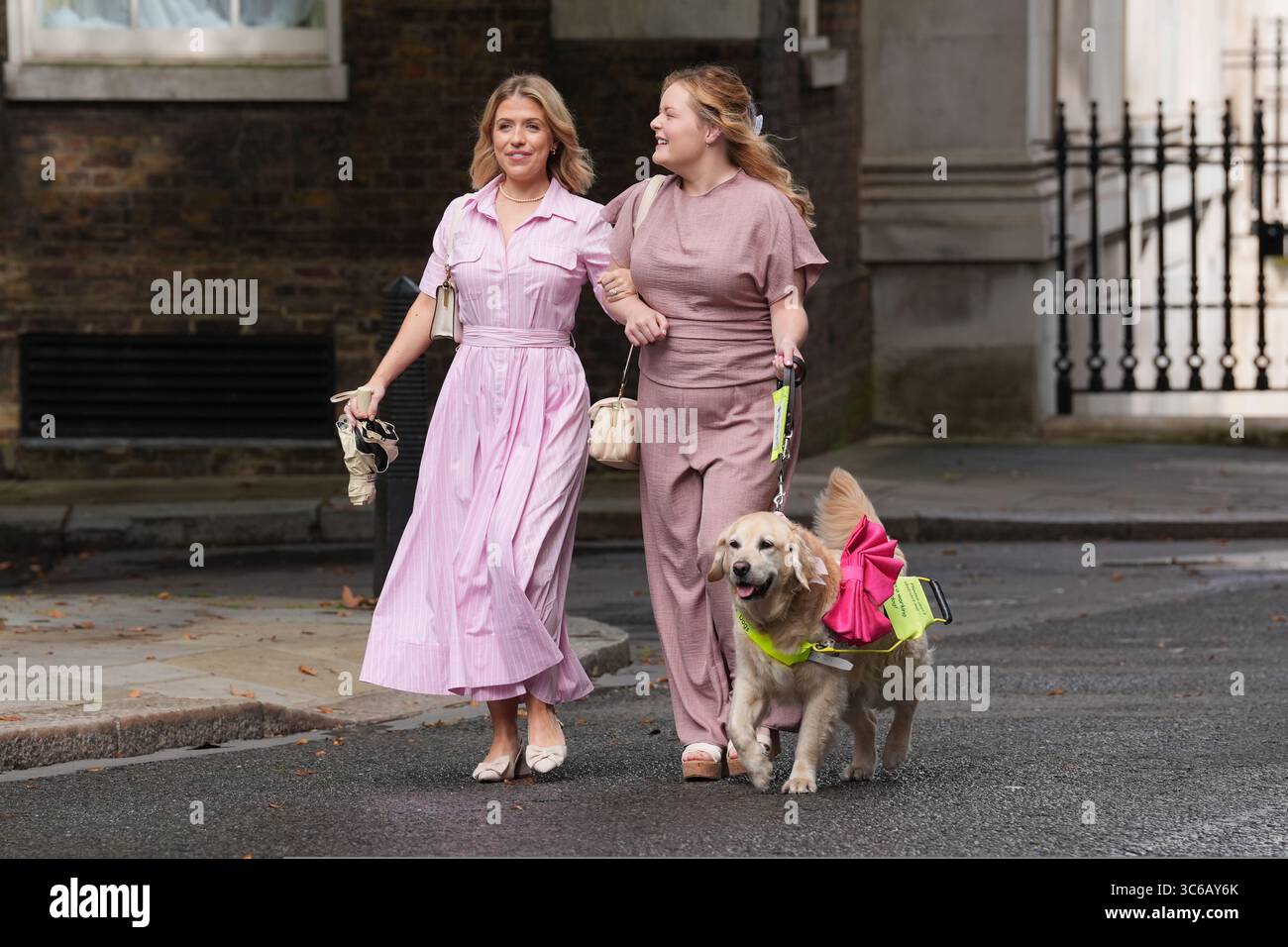 Lucy Edwards (right) arriving for a reception hosted by Prime Minister ...