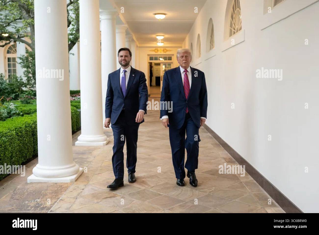Vice president J.D. Vance and President Donald J. Trump walk through ...
