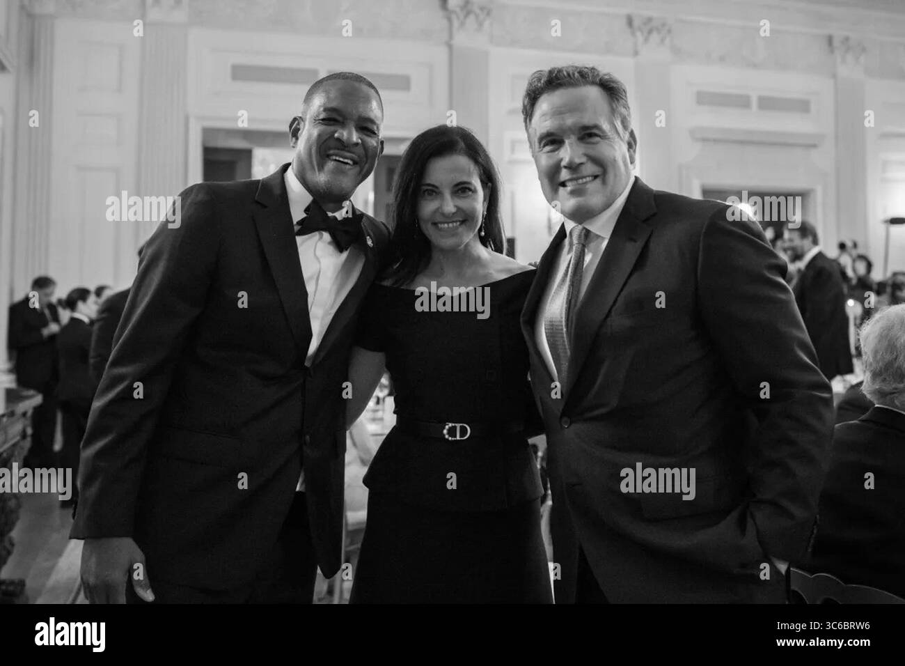 Guests pose together at the White House during a GOP leadership dinner ...