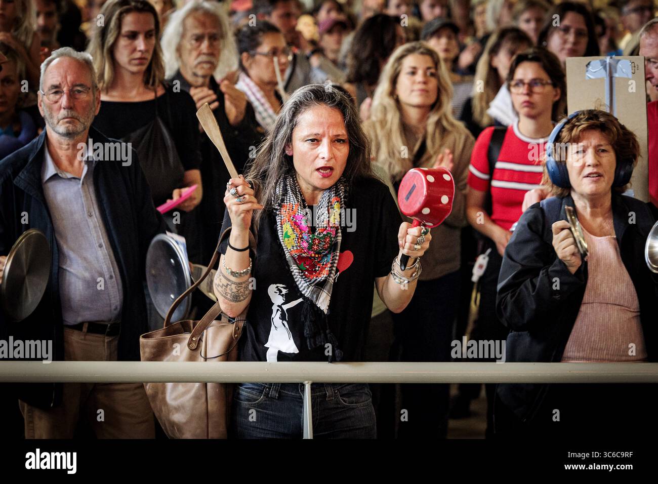 AMSTERDAM - Participants during a protest at Amsterdam Central Station ...