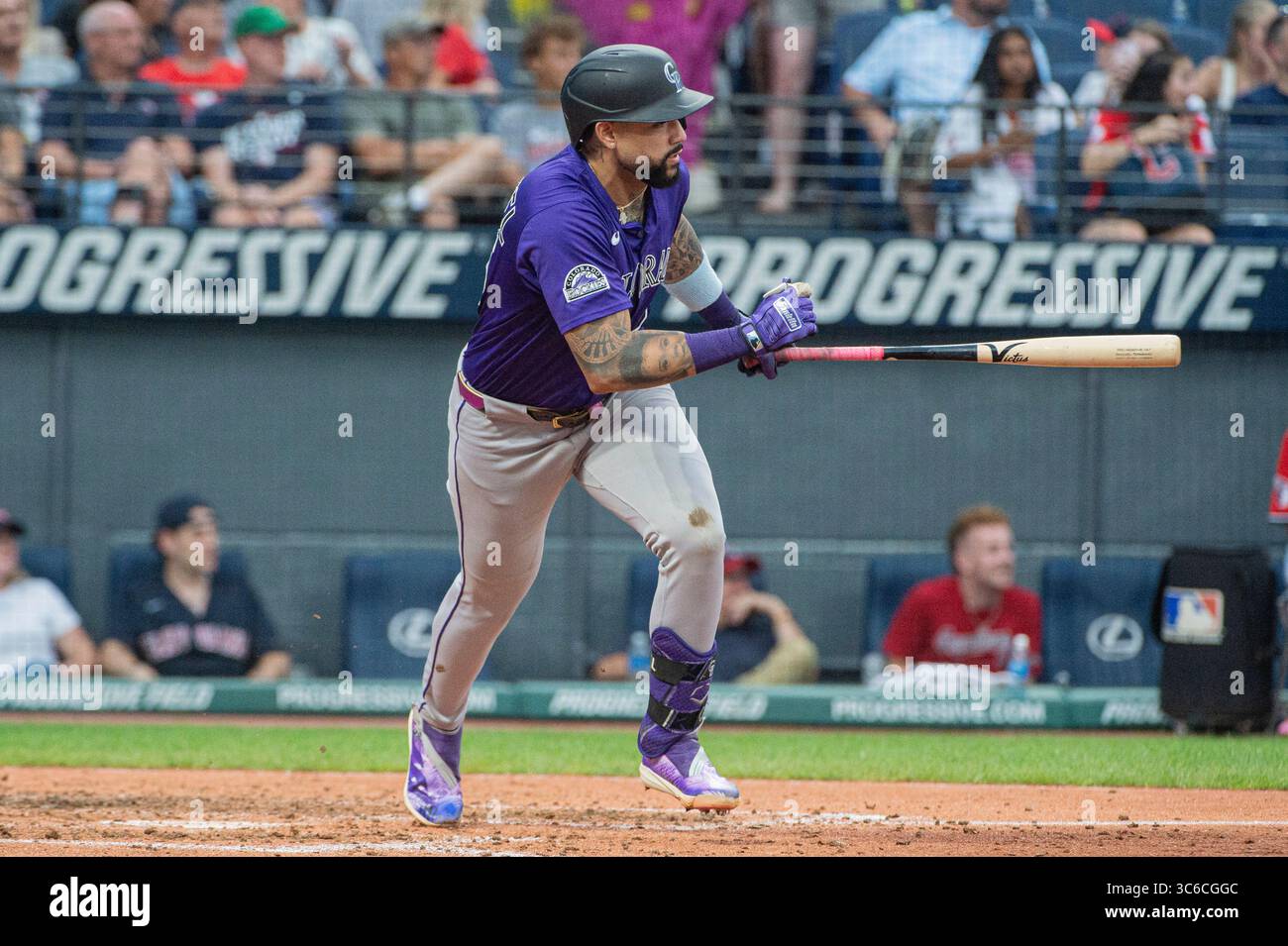 Colorado Rockies' Warming Bernabel watches his single off Cleveland ...