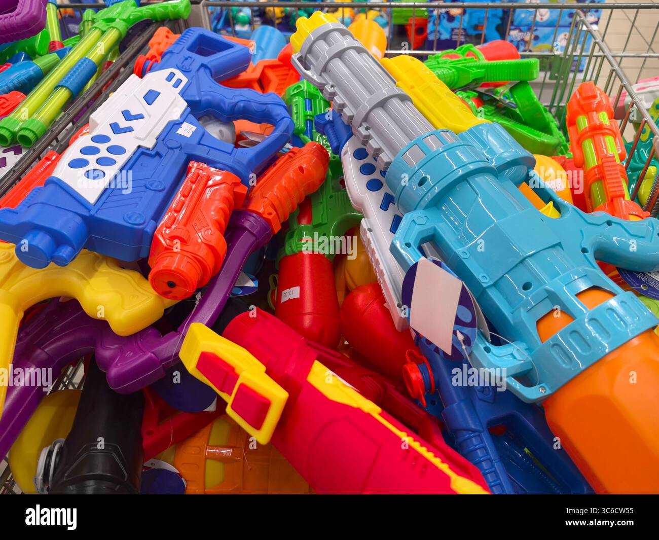 Colorful plastic water guns hi-res stock photography and images - Alamy