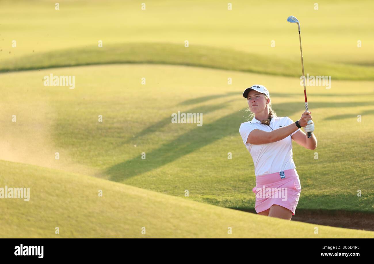 England's Mimi Rhodes plays from a bunker on the 18th on day one of the ...