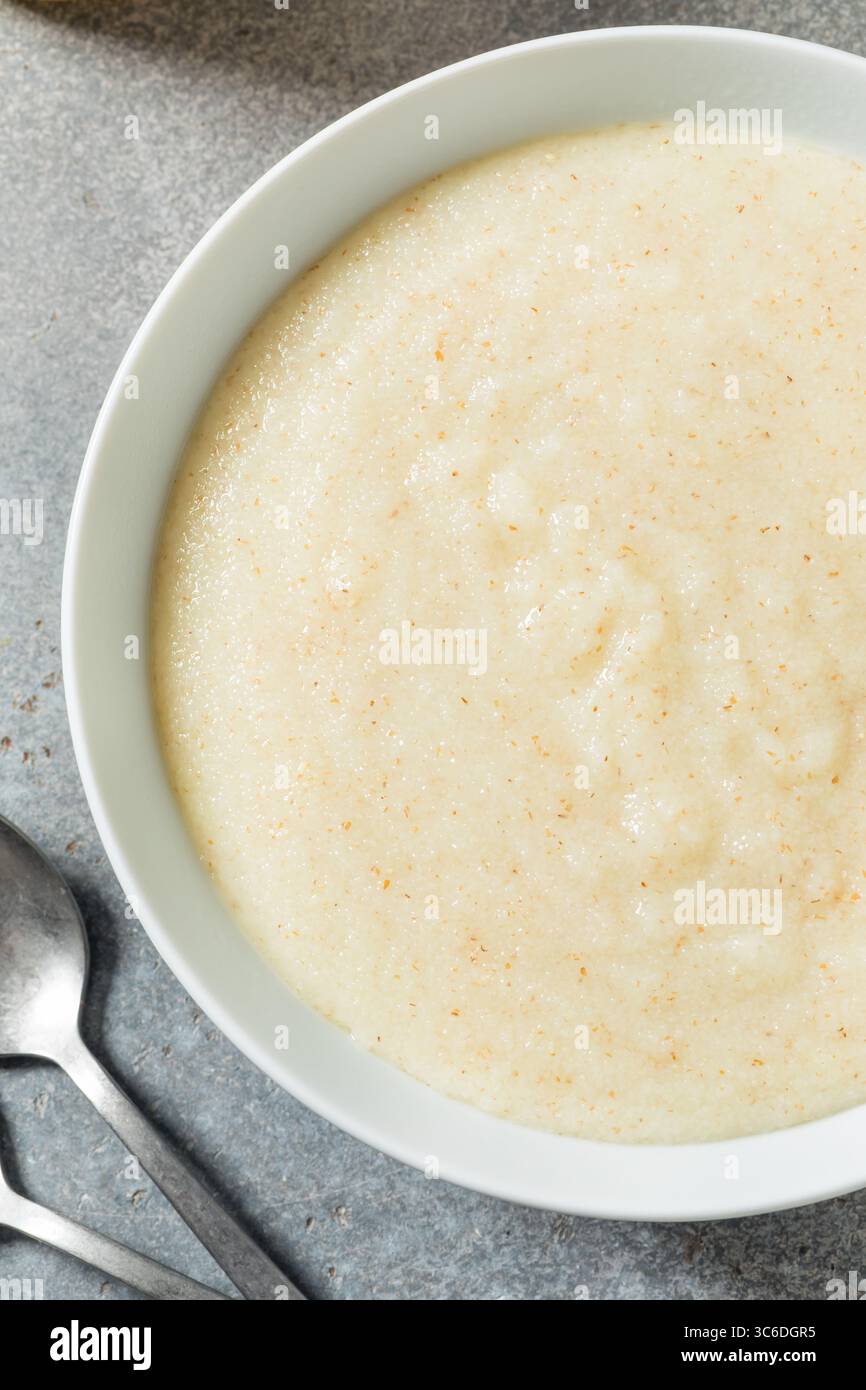 Healthy Homemade Breakfast Farina Porridge in a Bowl with Butter Stock ...