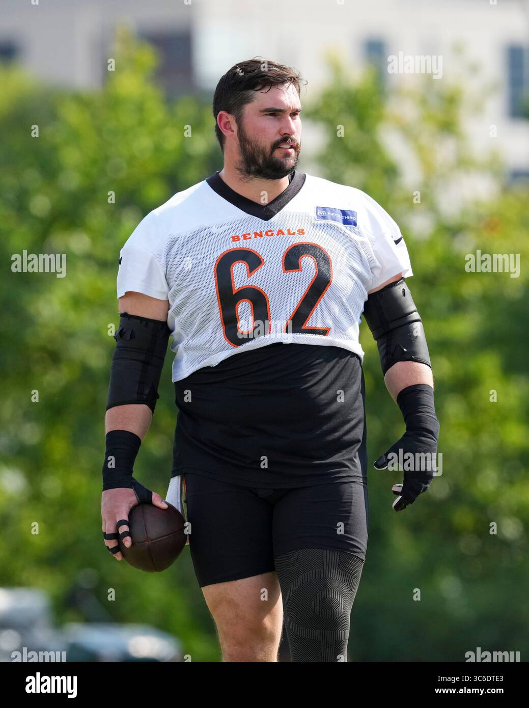 Cincinnati Bengals guard Lucas Patrick (62) looks on during practice at ...