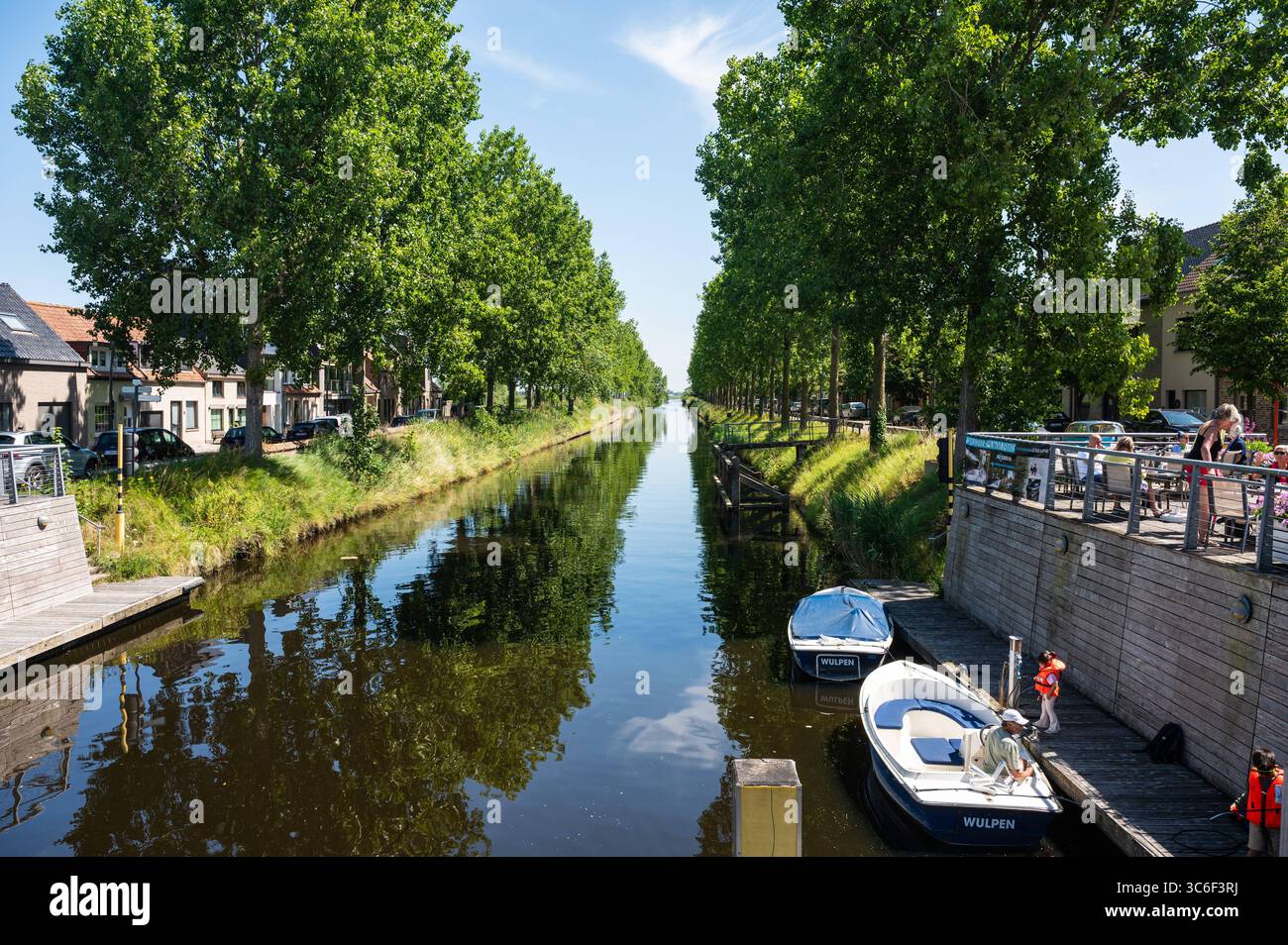 The recreational canal Nieuwpoort Duinkerke with boats and green ...