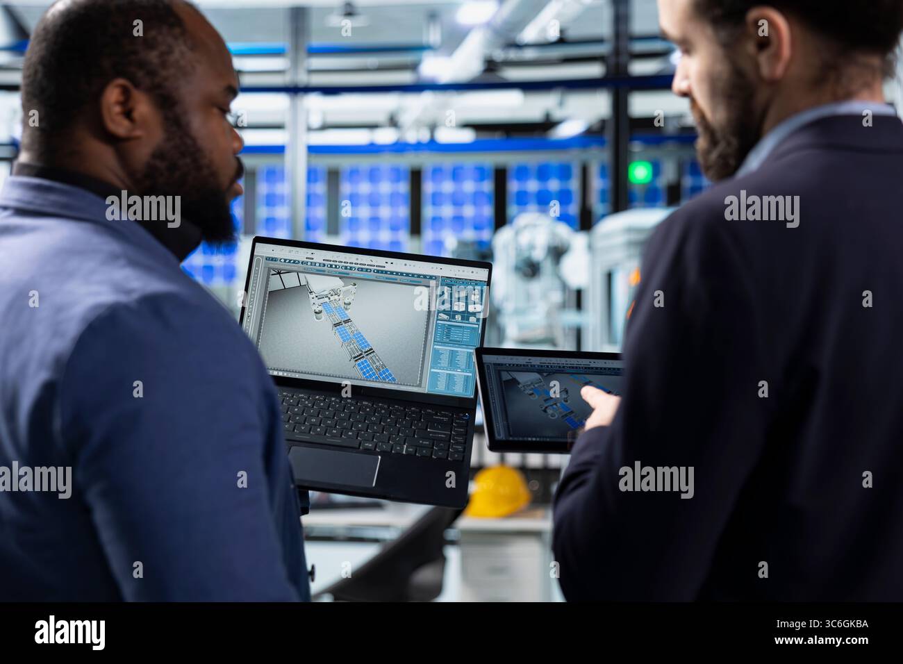 Multiethnic solar panel engineering hi-res stock photography and images ...