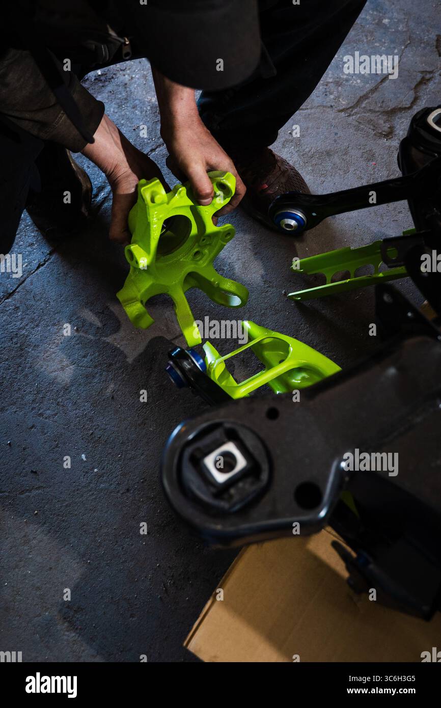 Hands-on installation process of front suspension components for a ...