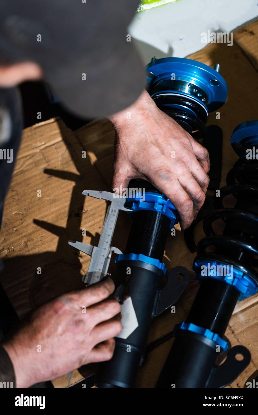 Adjusting coilover height and preload with micrometer precision ensures ...