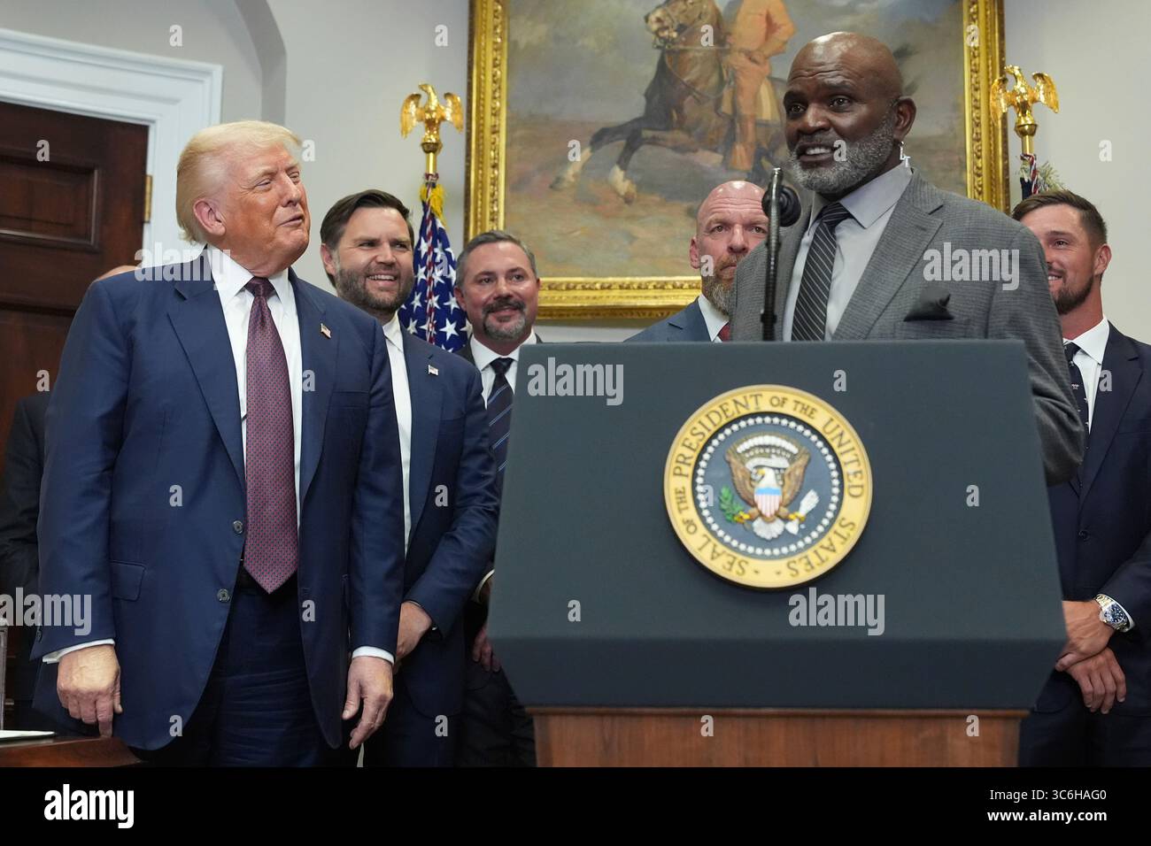 Former NFL football player Lawrence Taylor speaks as President Donald ...