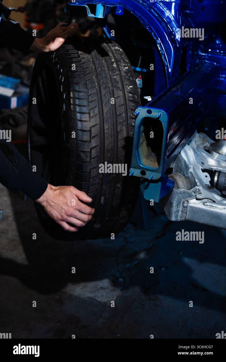 Performance wheel install on tuned suspension with visible brake system ...